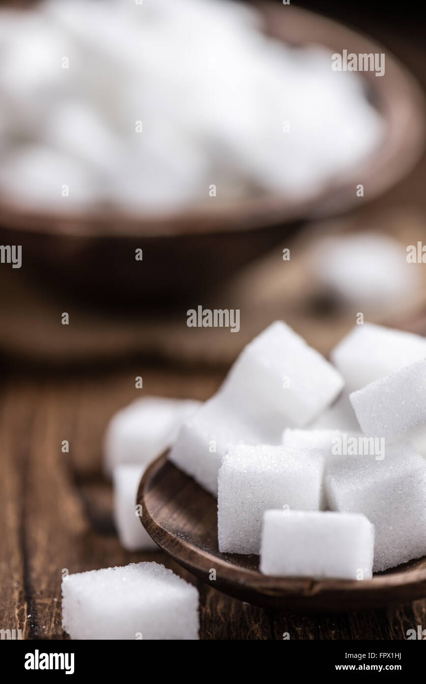 Portion of White Sugar (detailed close-up shot; selective focus) on ...