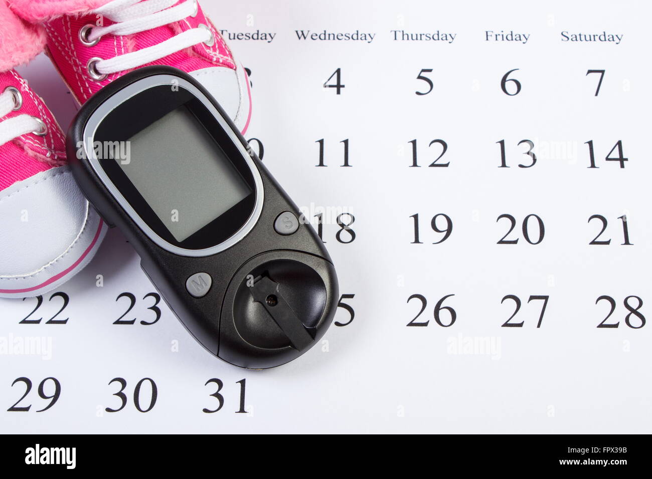 Glucose meter and shoes for newborn, chcecking sugar level in pregnant ...