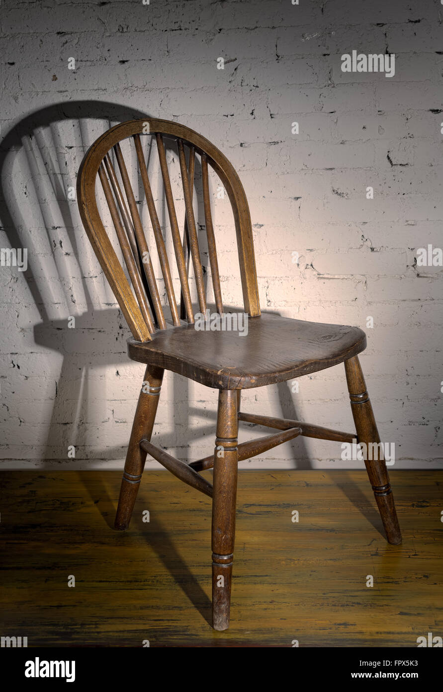Still Life of one vintage chair Stock Photo - Alamy