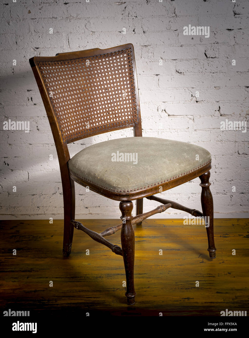 Still Life of one vintage chair Stock Photo - Alamy