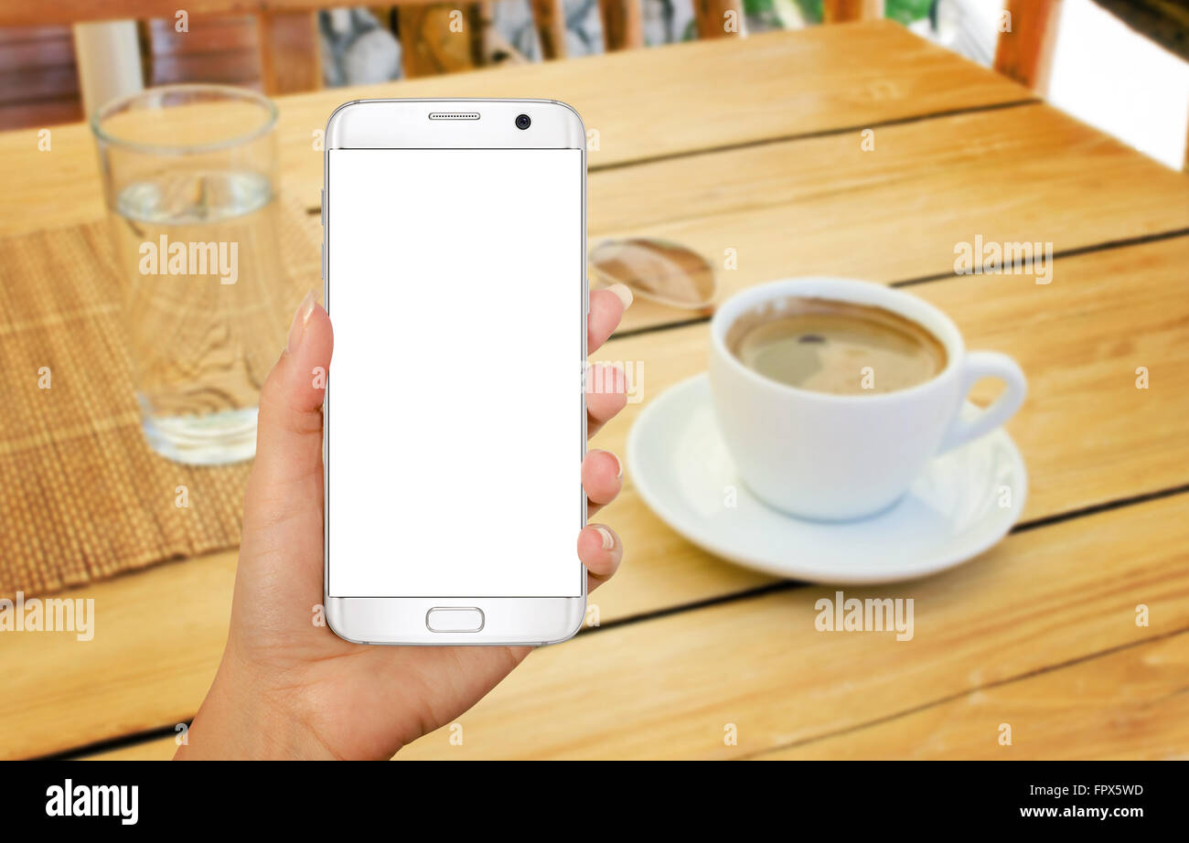Smart phone with isolated display for mockup in hand. Relax time with ...