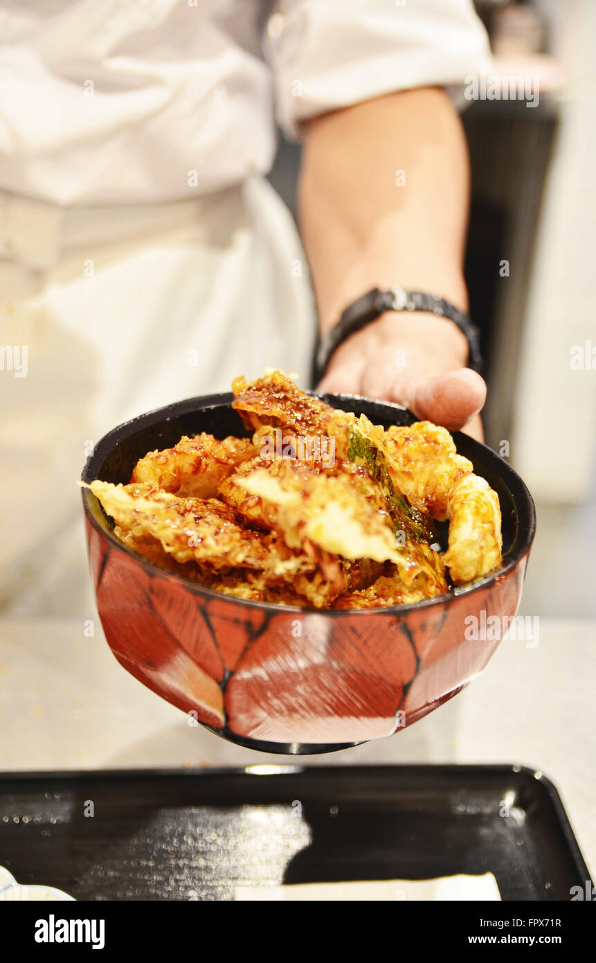 Hand pouring rice hi-res stock photography and images - Alamy