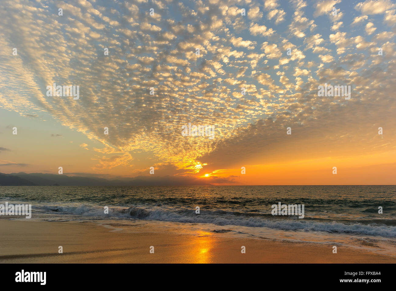 Sunrise and sandy beach with rolling waves hi-res stock photography and ...