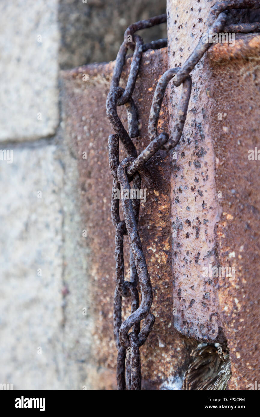 Details of an old rusty chain on a military fort Stock Photo - Alamy