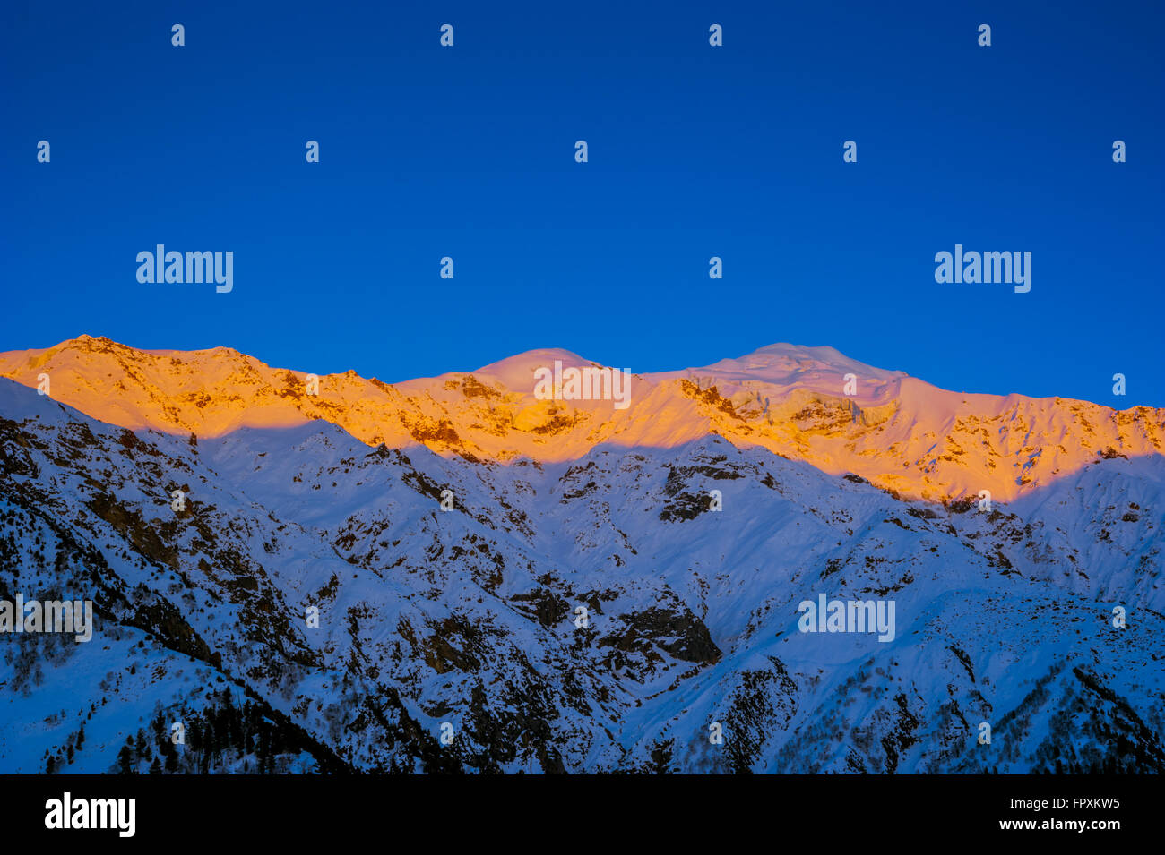 Sunrise over mountain peak Stock Photo - Alamy