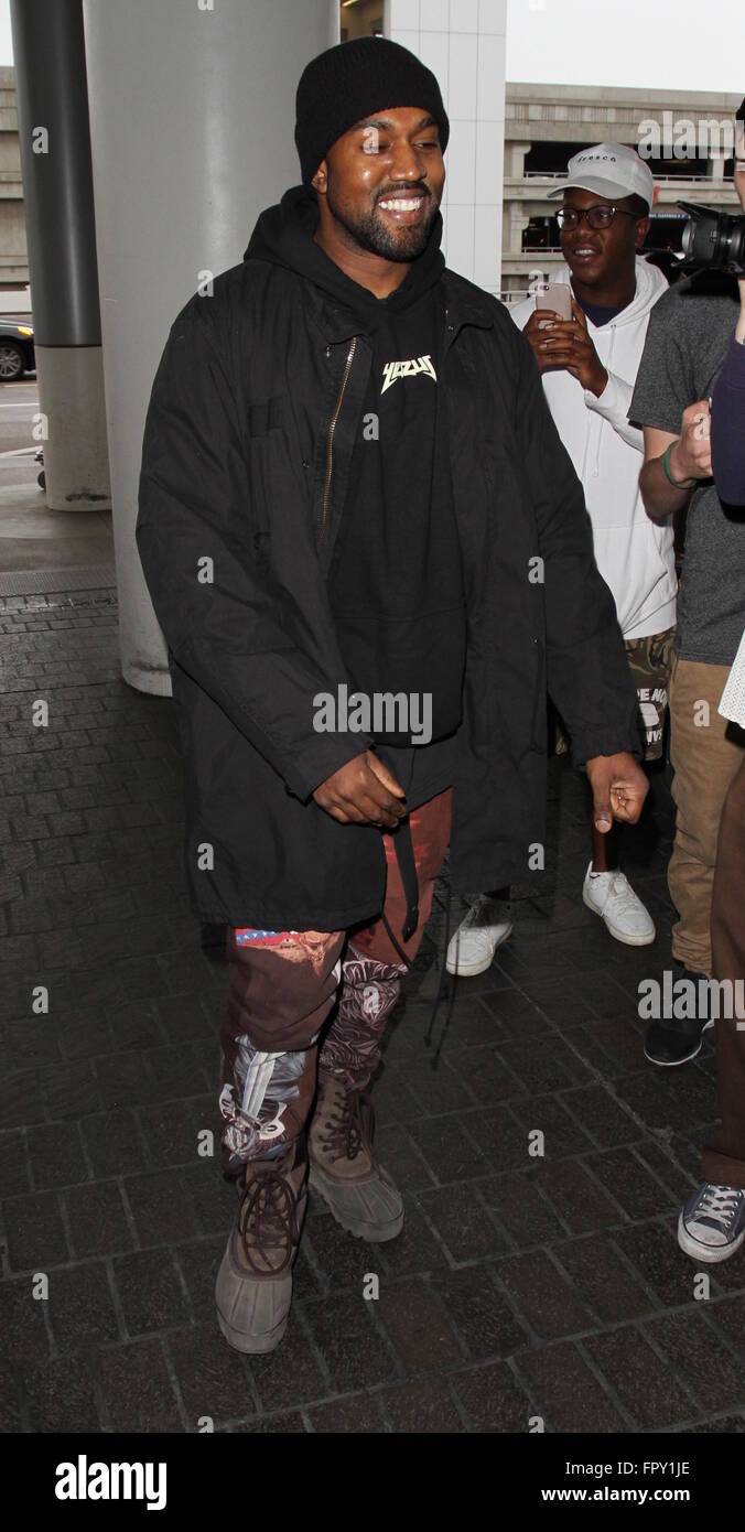 Kanye West departs on a flight from Los Angeles International Airport ...