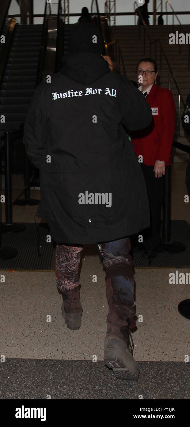 Kanye West departs on a flight from Los Angeles International Airport ...