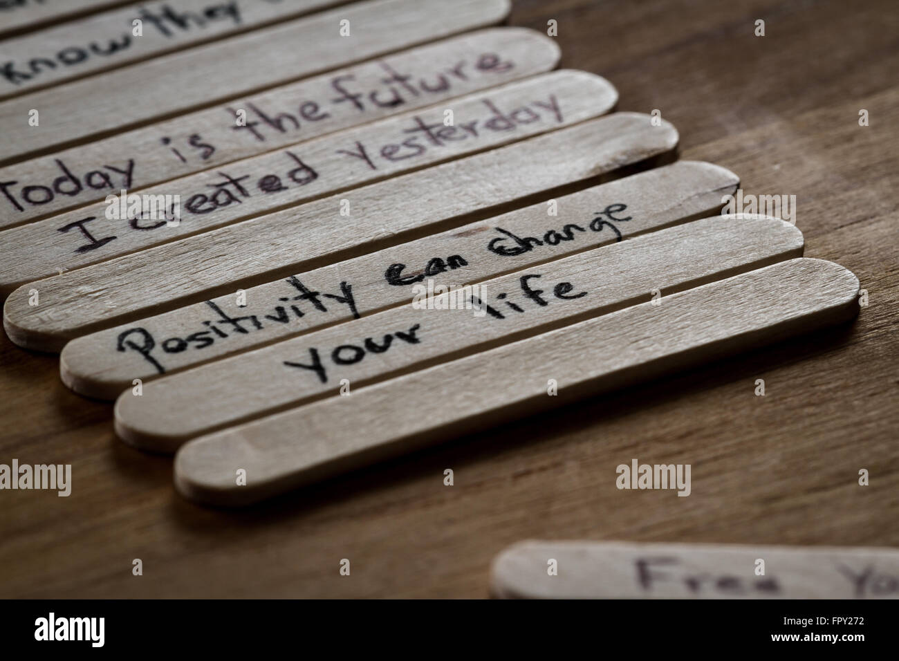 close up of a hand written message on a popsicle stick as a self esteem ...