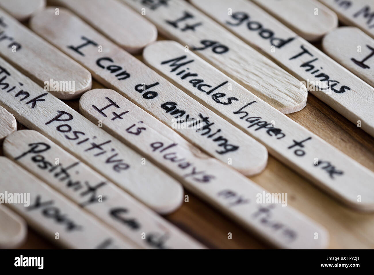 close up of a hand written message on a popsicle stick as a self esteem ...