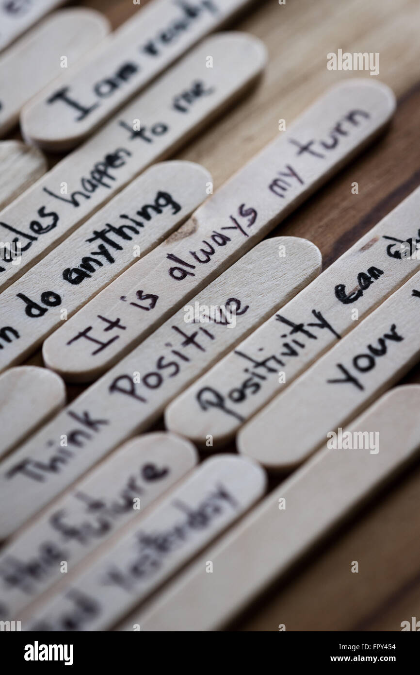close up of a hand written message on a popsicle stick as a self esteem ...