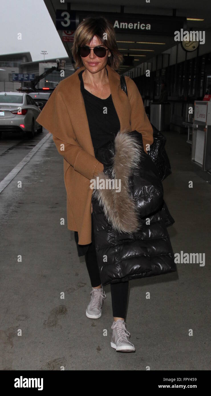 Lisa Rinna arrives on a flight to Los Angeles International Airport ...