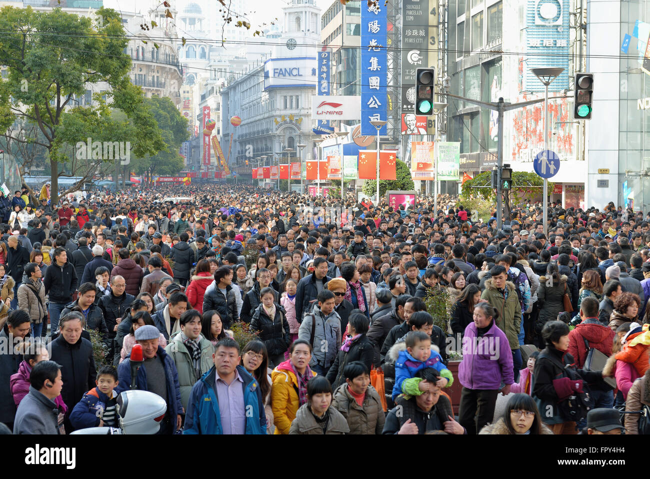 Crowd in the Lu Nanjing Road, main shopping street of Shanghai, China ...