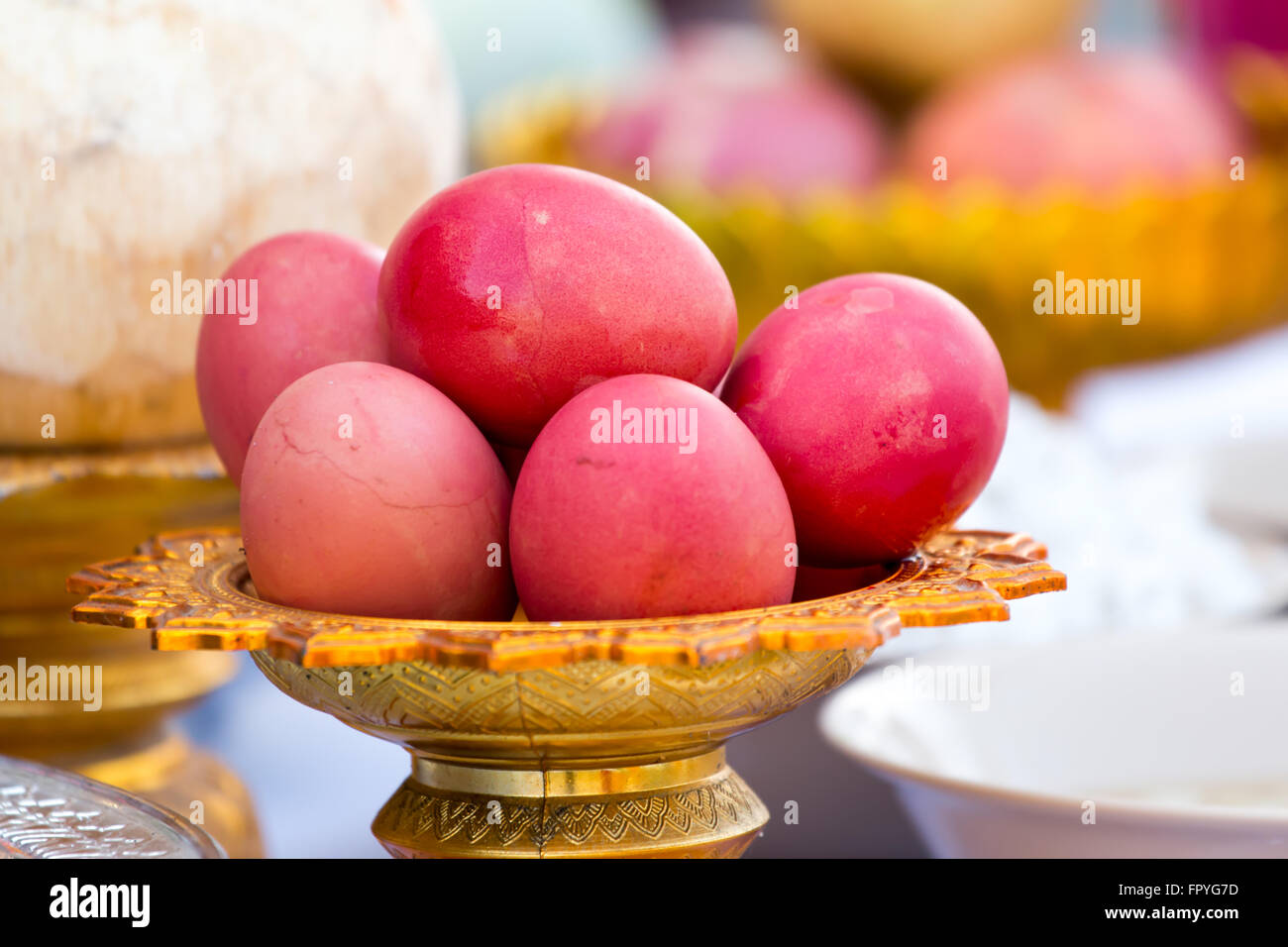 Red eggs sacrifice and traditional worship Stock Photo - Alamy