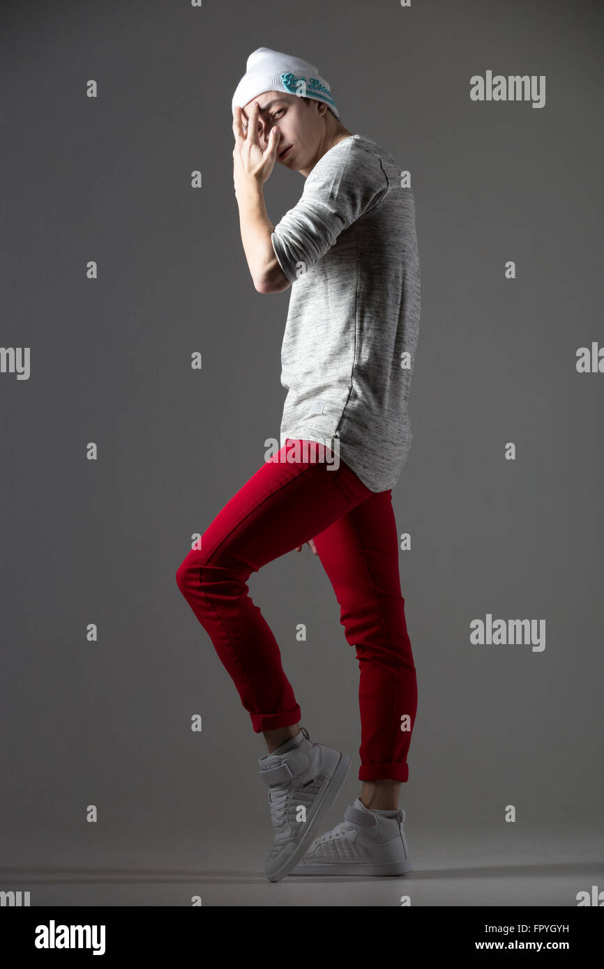 Portrait of one attractive fit young man dancing, working out wearing ...