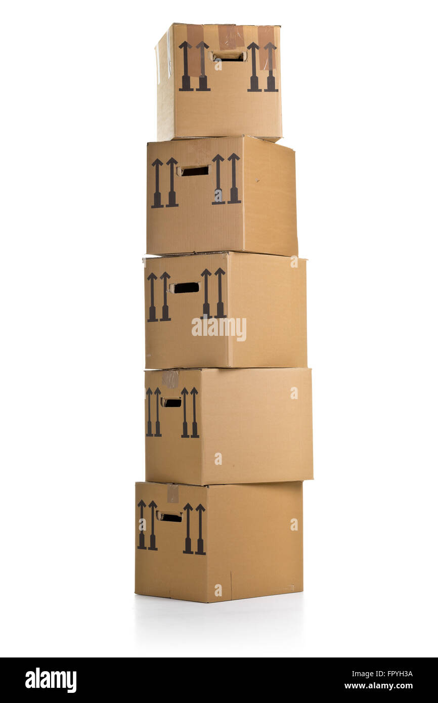Stacked moving carton boxes over white background Stock Photo - Alamy