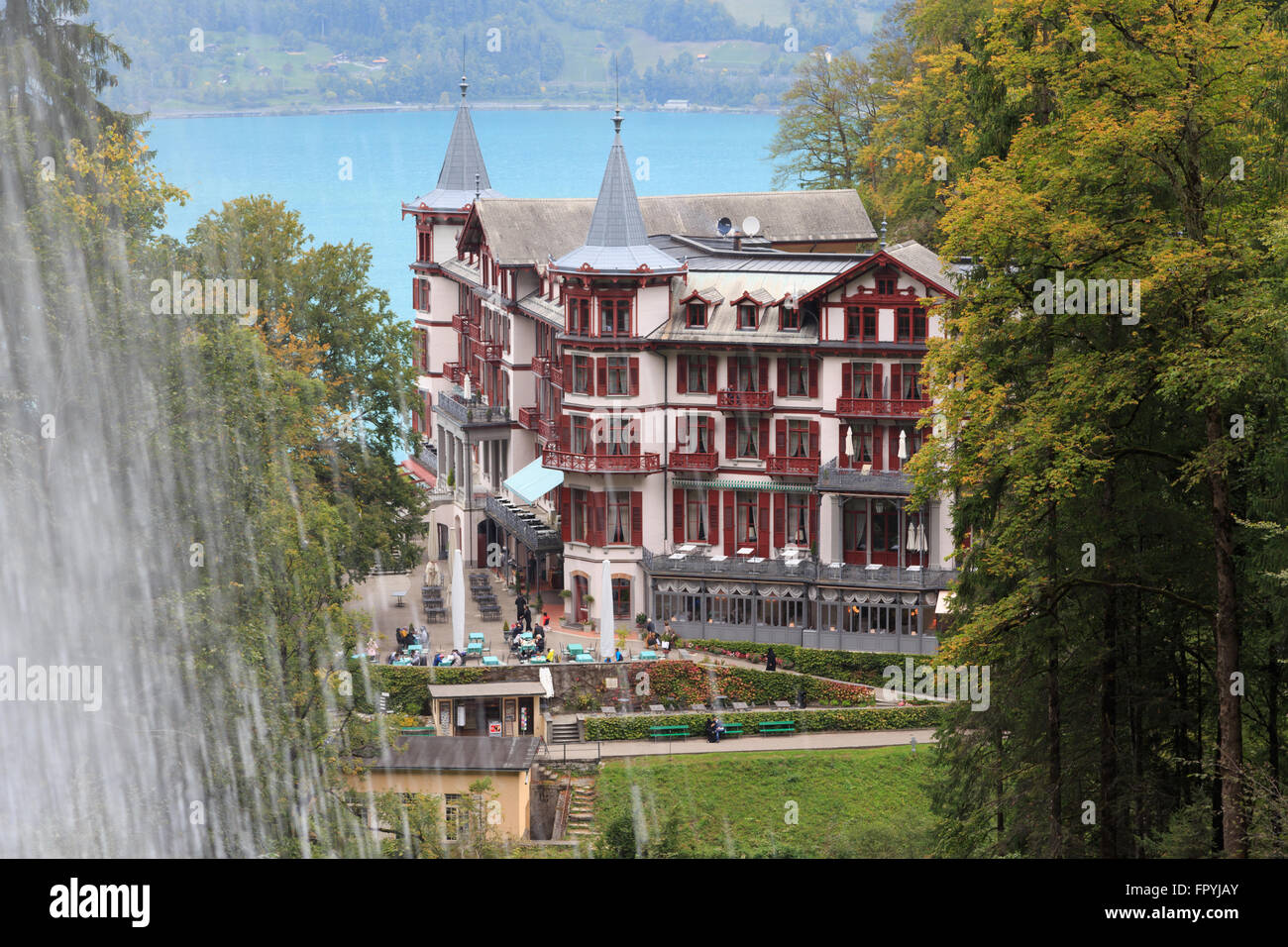 A photograph of the Grand Hotel Giessbach as seen from behind the ...