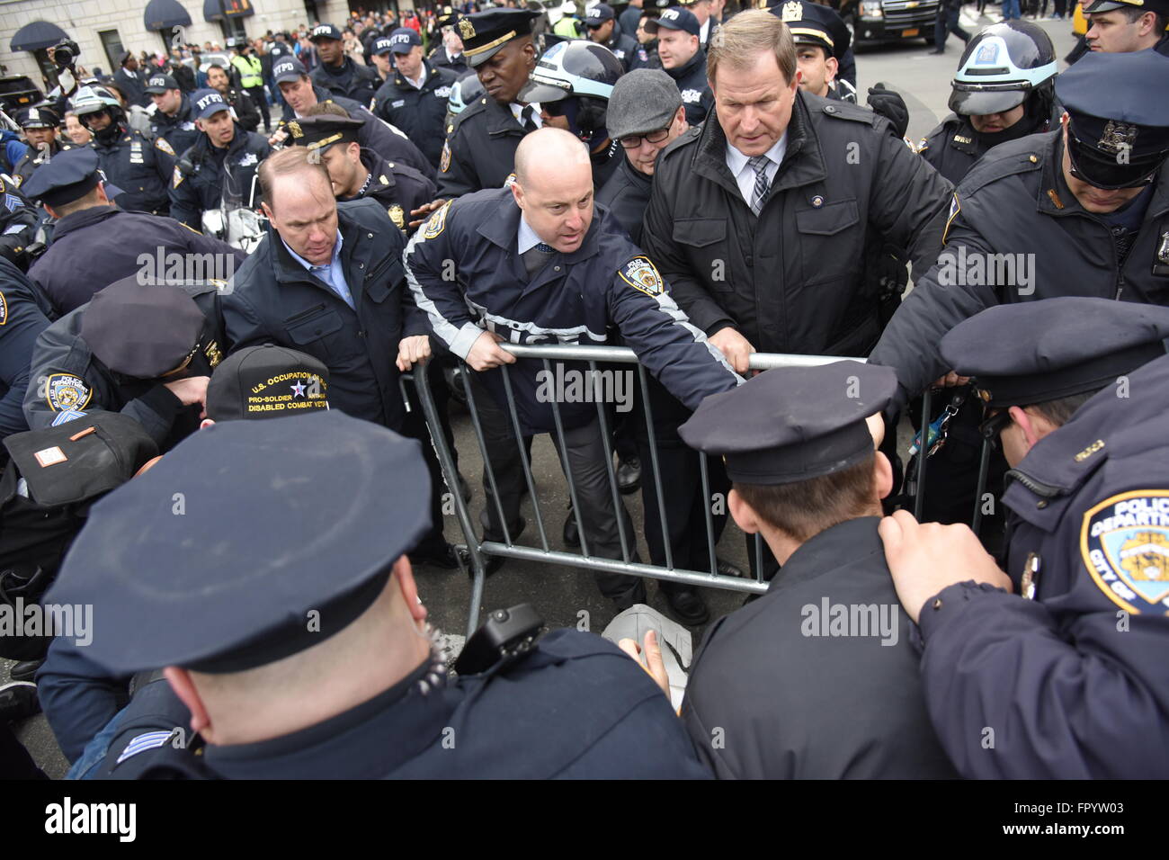 New York City, United States. 19th Mar, 2016. NYPD battle against crowd ...