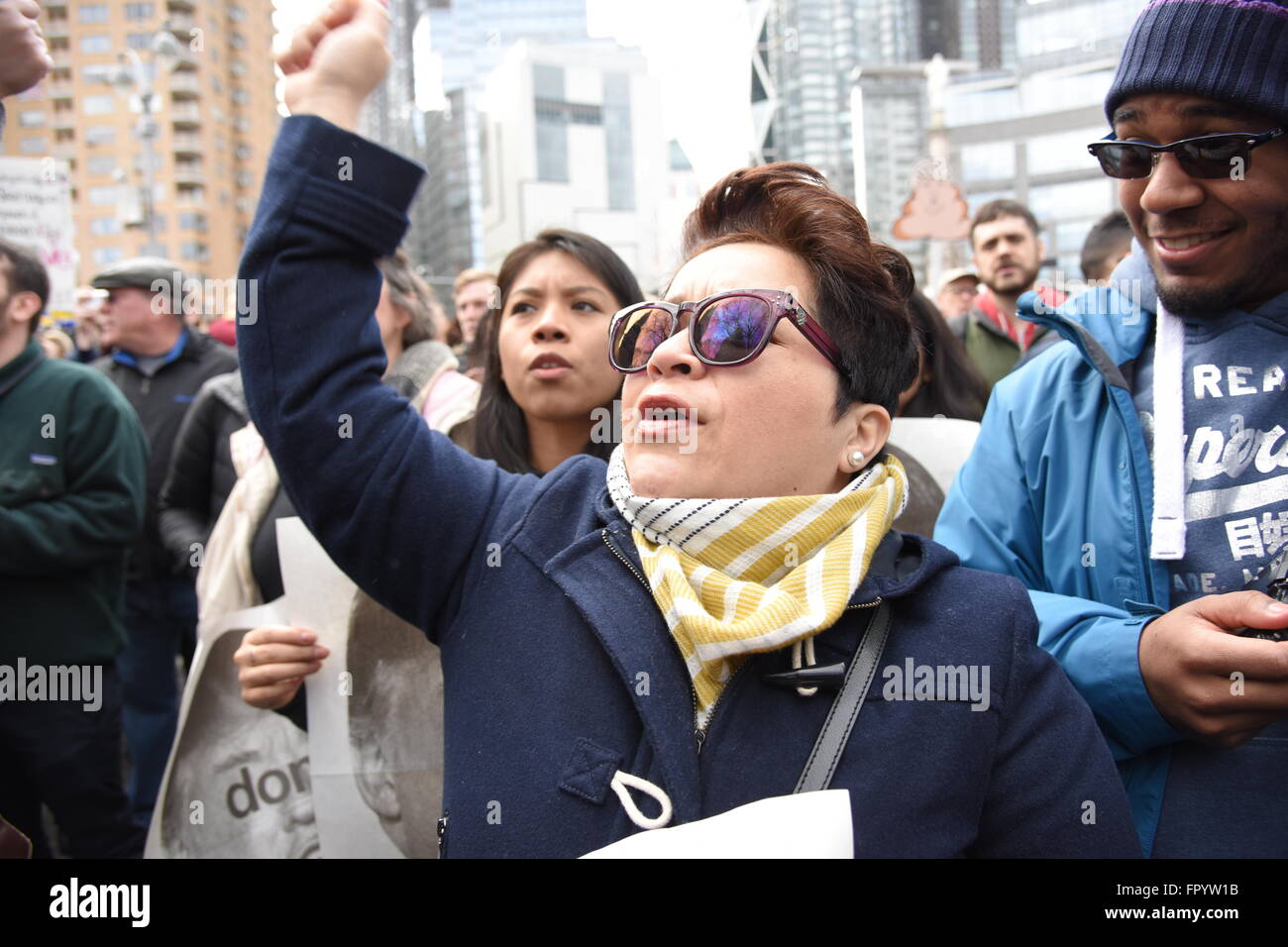 New York City, United States. 19th Mar, 2016. Activist making a point ...