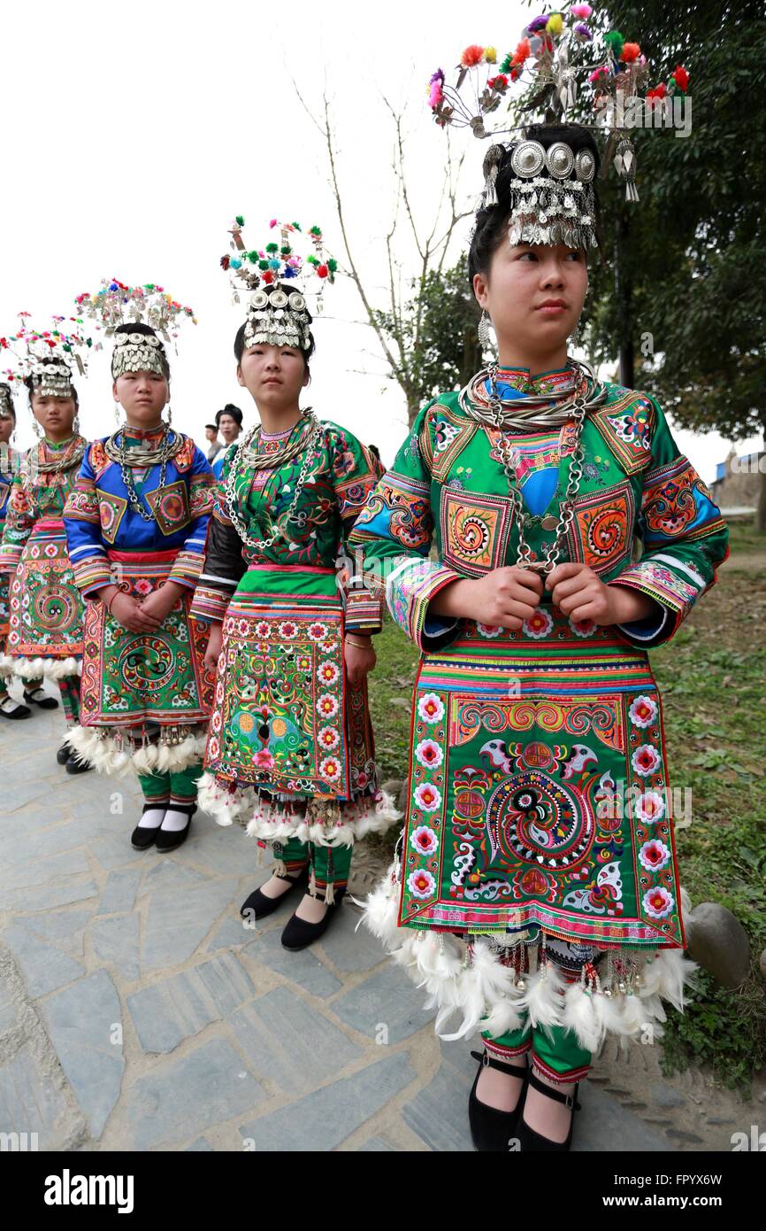 Qiandongnan, China's Guizhou Province. 19th Mar, 2016. Girls show ...