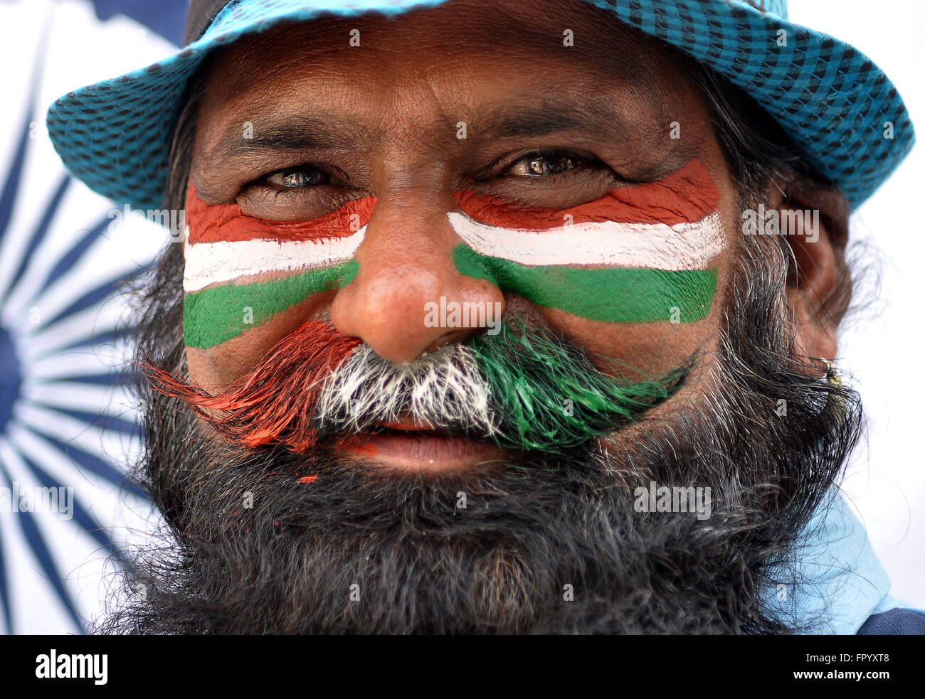 Bikaner, India. 19th Mar, 2016. An avid fan of Indian cricket team with ...