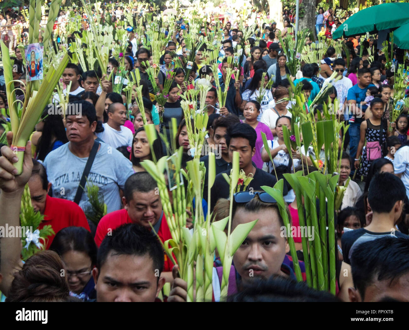 Paranaque City, Philippines. 20th Mar, 2016. Filipinos attend mass at ...
