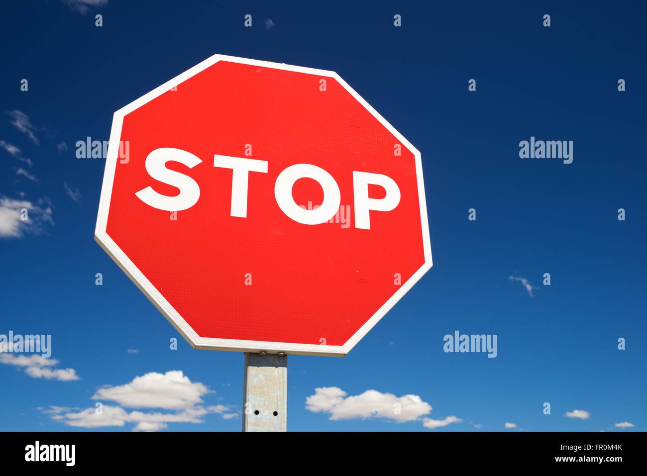 Stop traffic sign with blue sky Stock Photo - Alamy