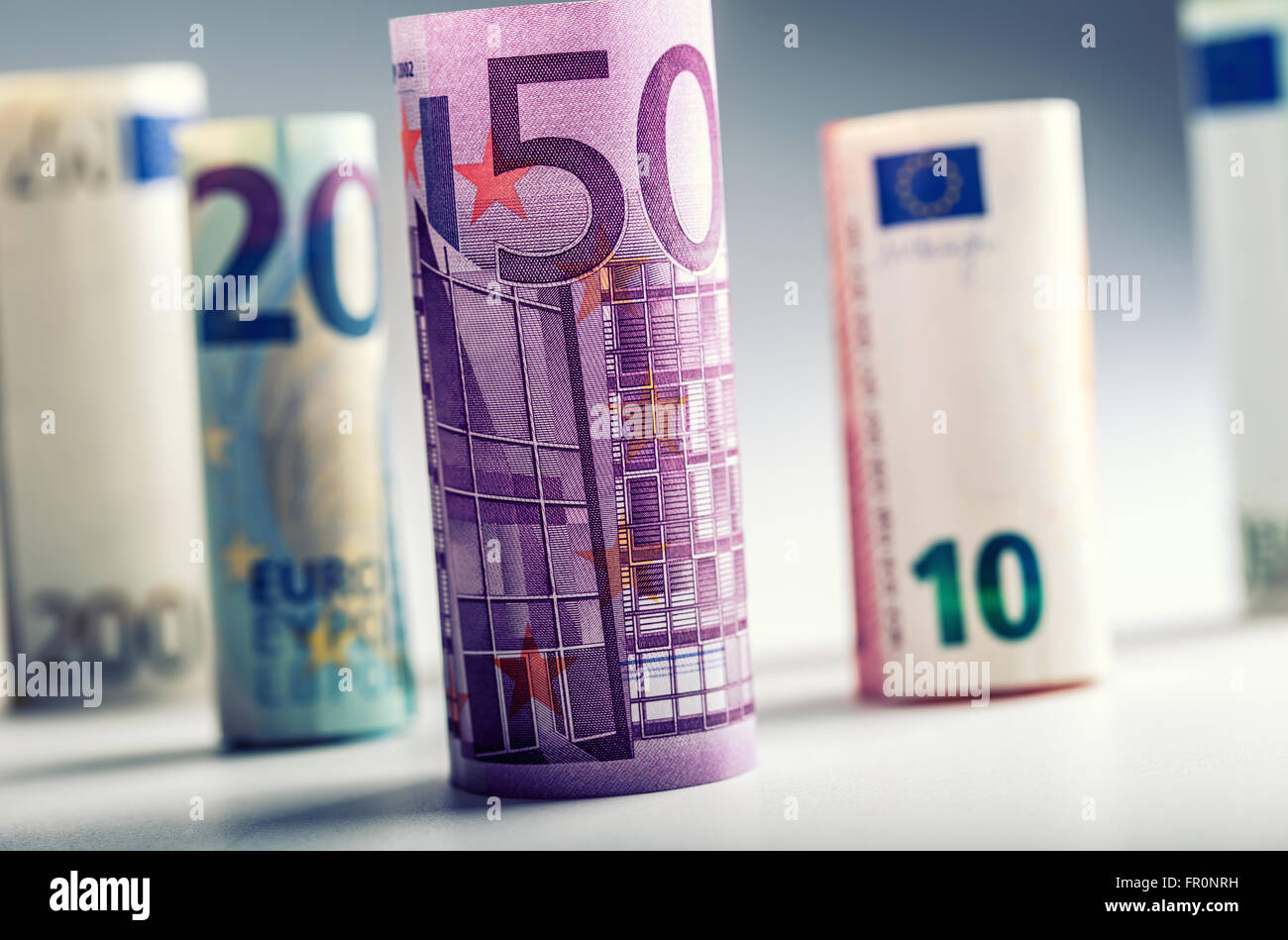 Several hundred euro banknotes stacked by value. Euro money concept ...