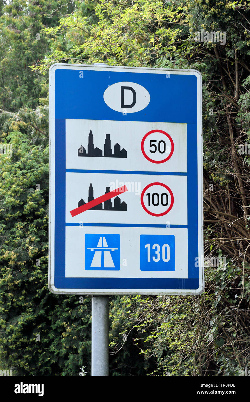 Road side sign indicating speed limits as you enter Germany (from ...
