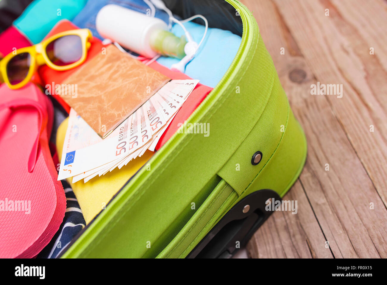 Suitcase with things Stock Photo - Alamy