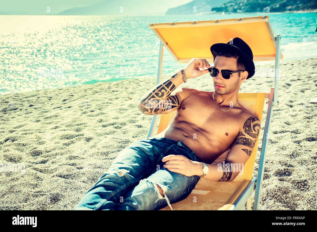 Man on beach hi-res stock photography and images - Alamy