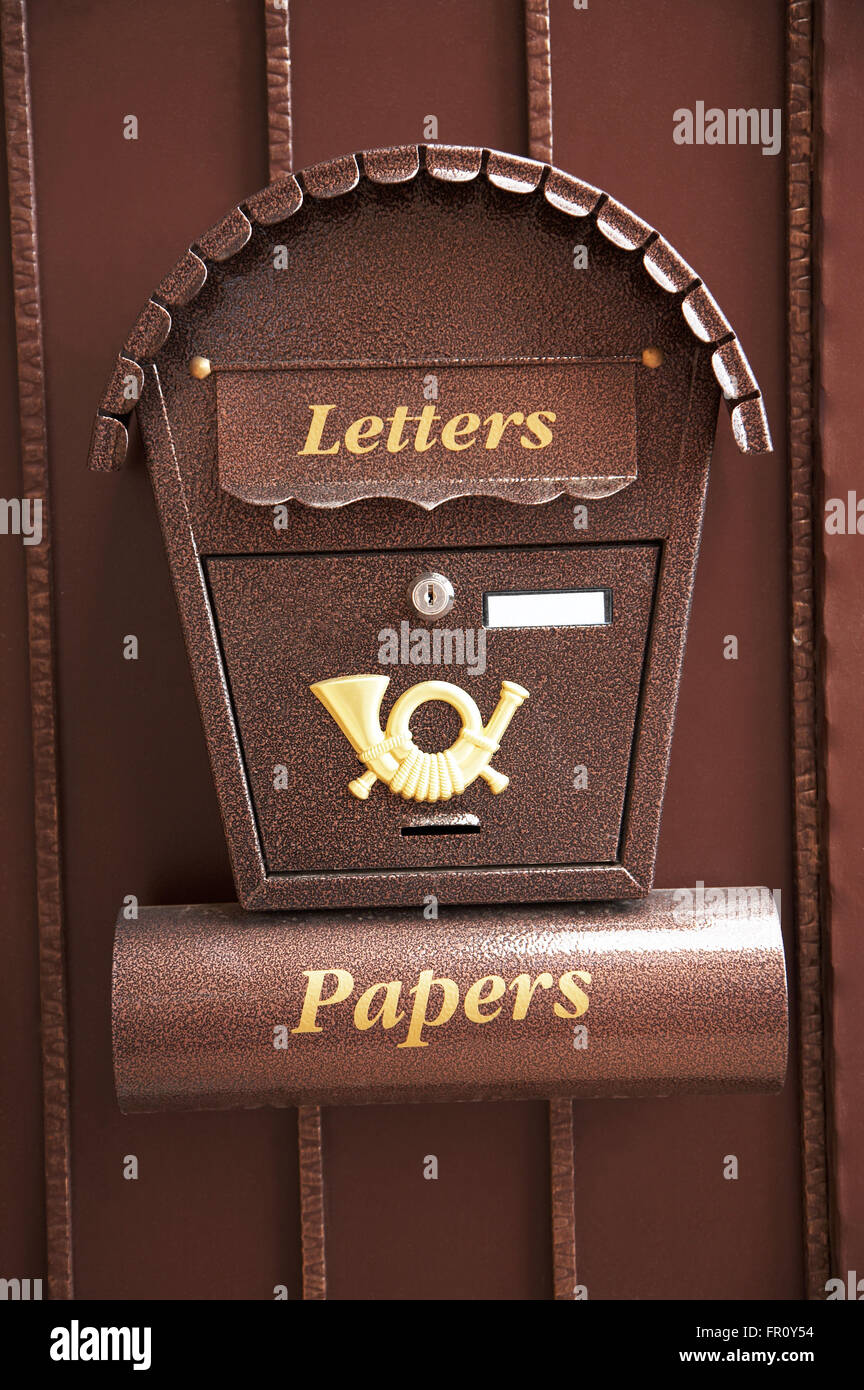 New and beautiful mail box on a metal gate Stock Photo - Alamy