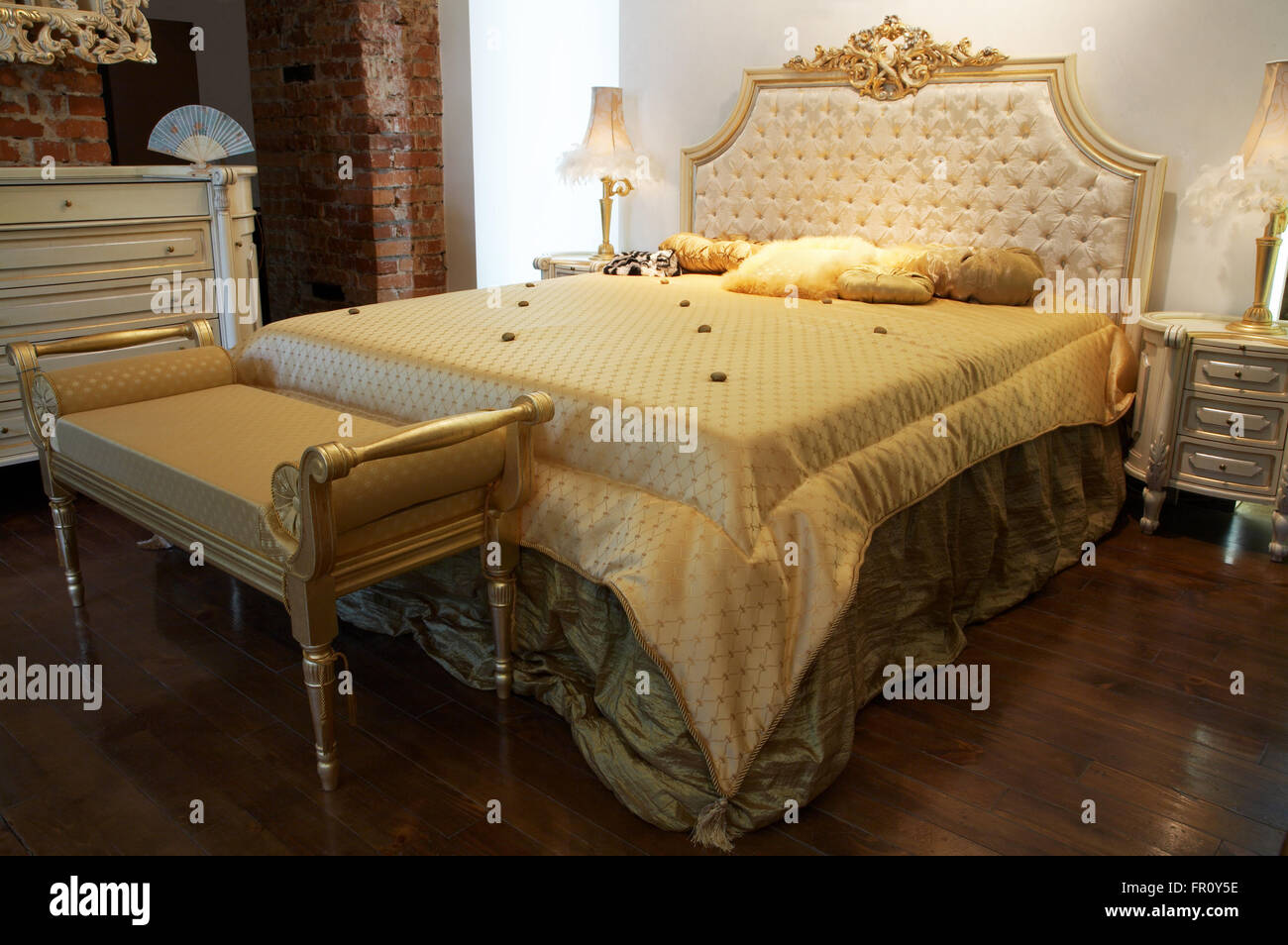 Beautiful and wide bed in a modern bedroom Stock Photo - Alamy