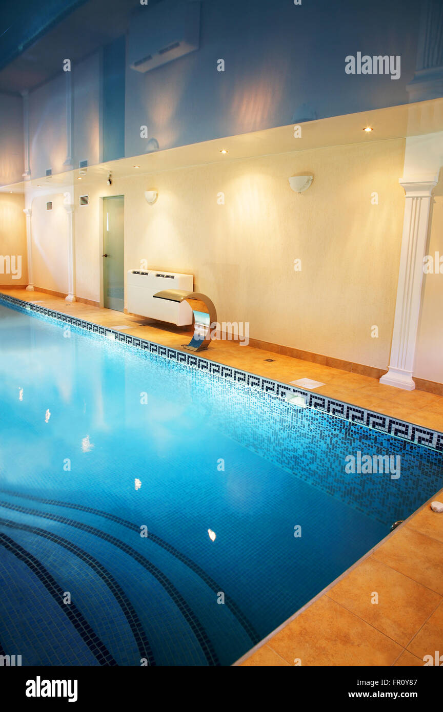 Modern pool with a mirror ceiling in luxurious hotel Stock Photo - Alamy