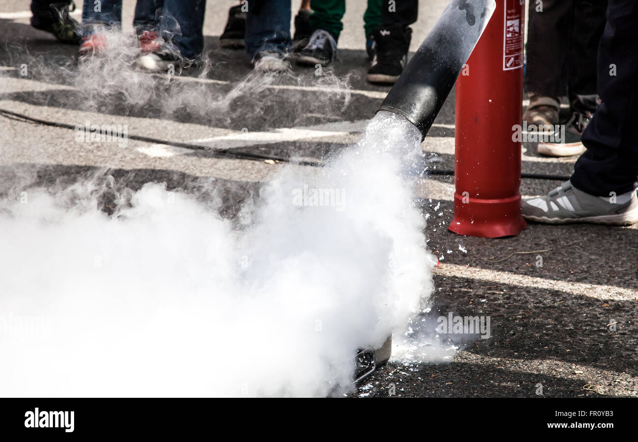 Fighting fire powder extinguisher hi-res stock photography and images ...
