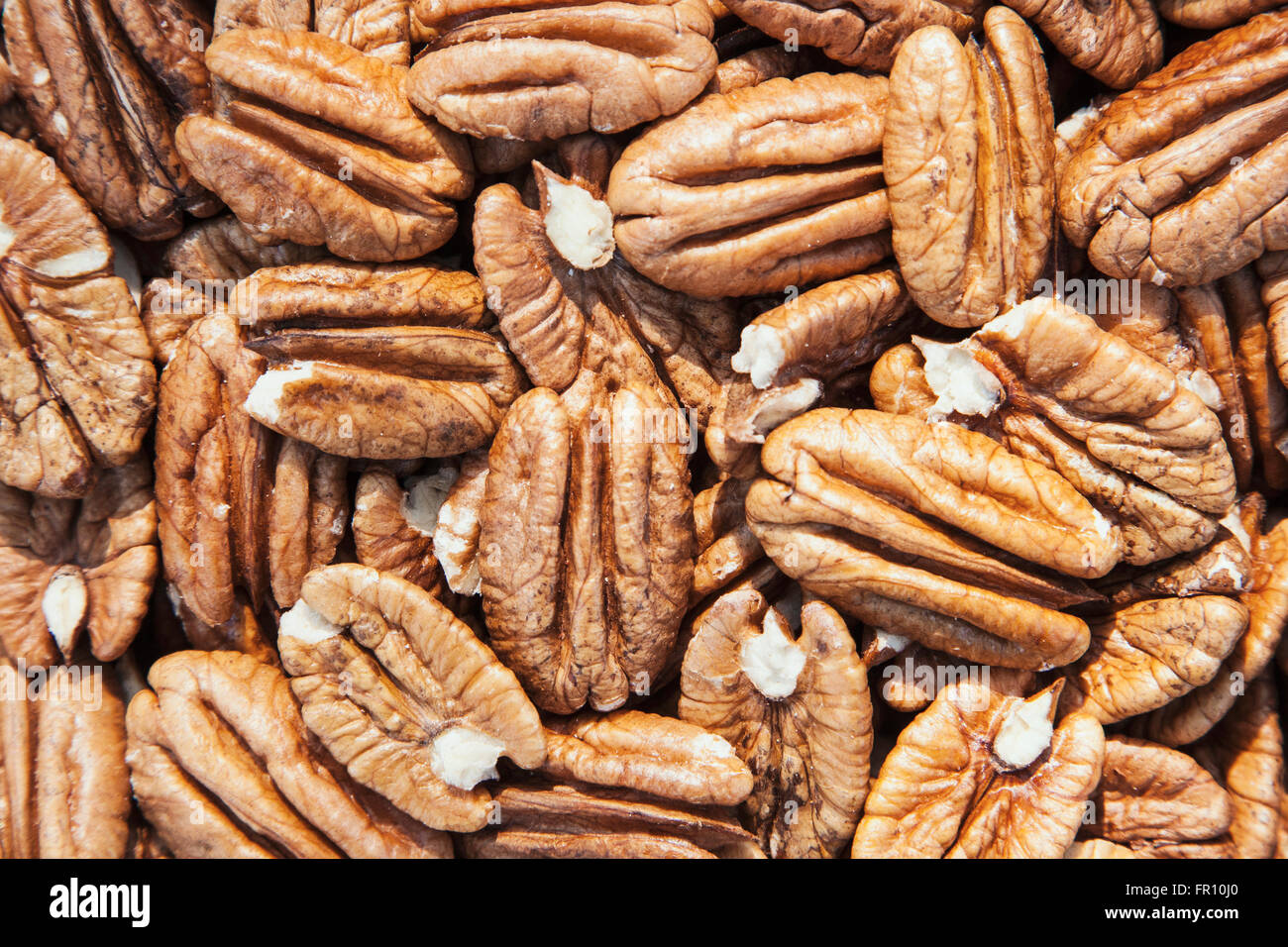 A tray of cleaned Pecans ready for eating or to use in cooking. Pecans ...