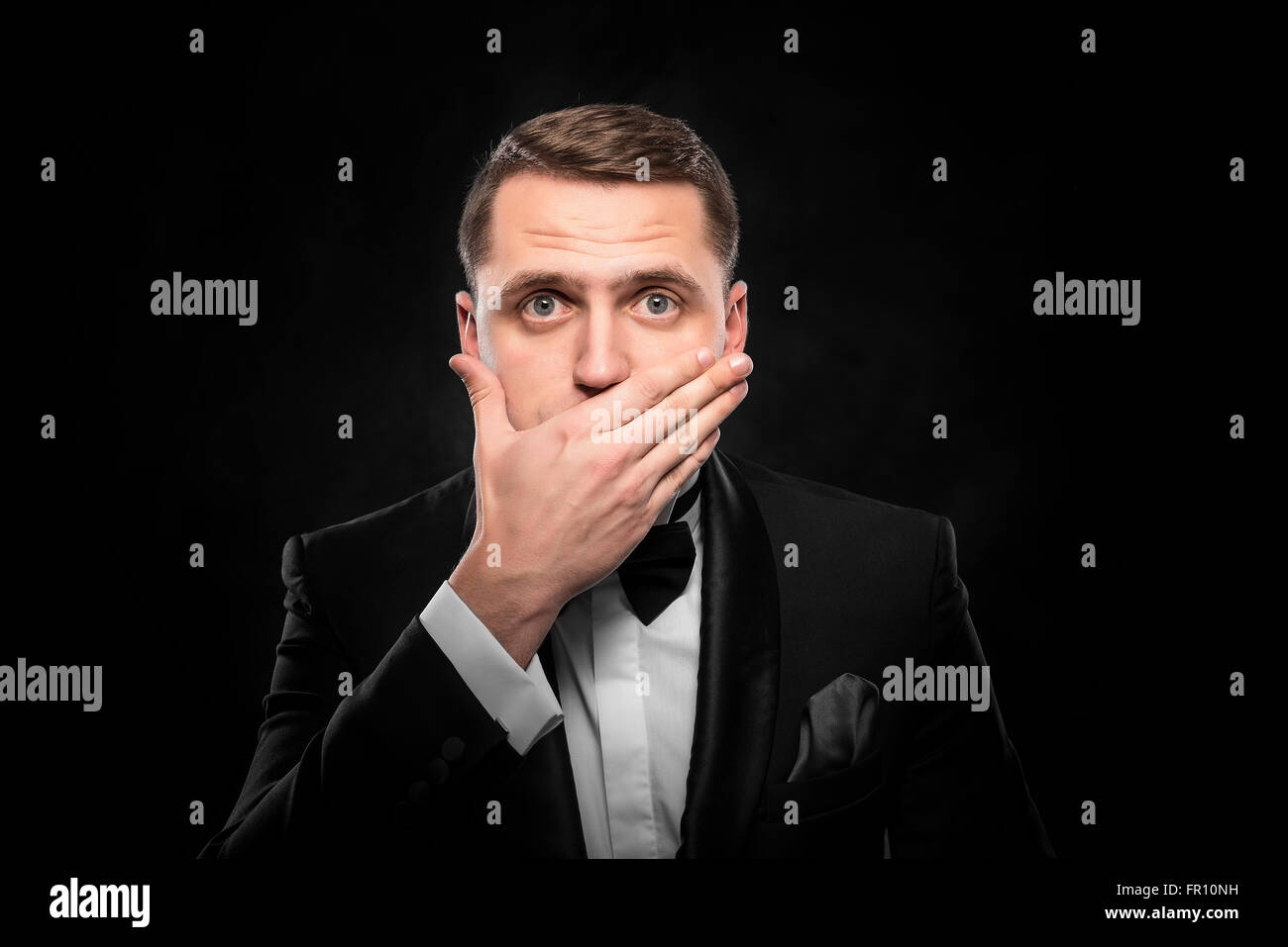 Hand covering mouth hi-res stock photography and images - Alamy