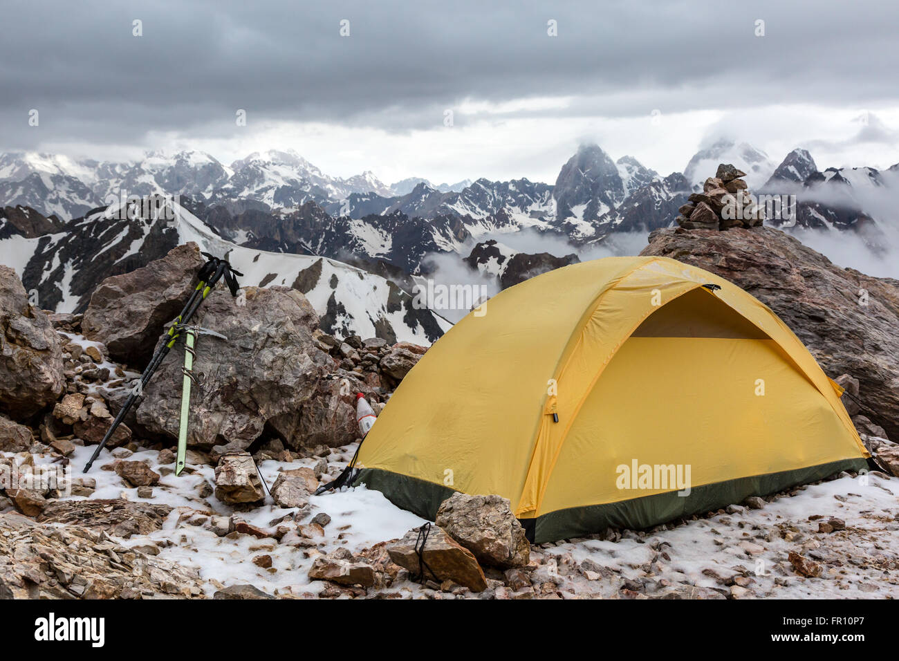 Yellow tent on mountain landscape Stock Photo - Alamy