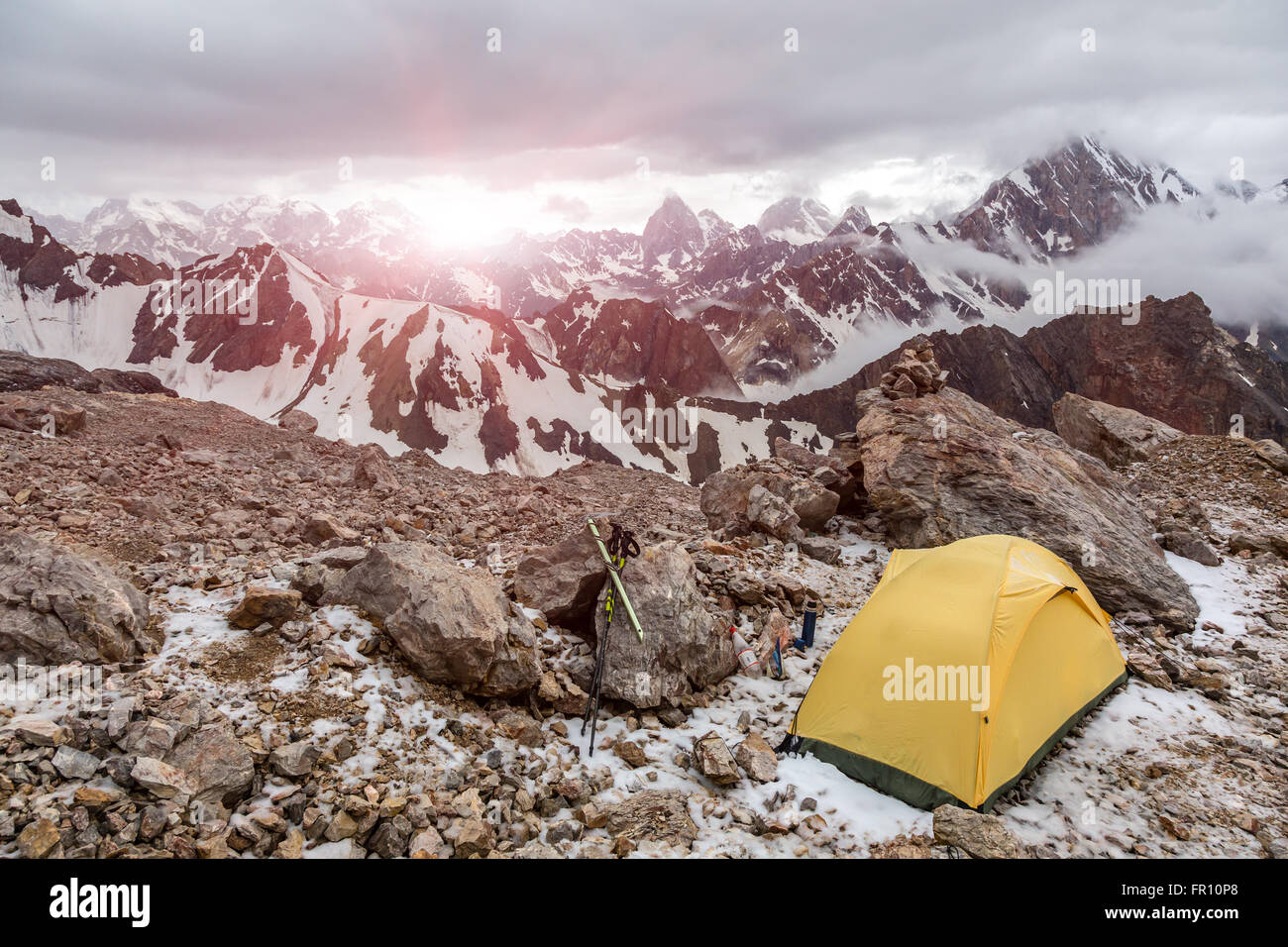 Yellow tent on mountain landscape Stock Photo - Alamy