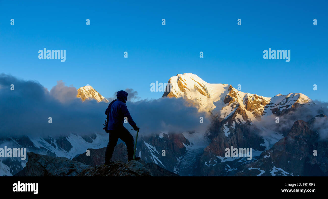 Mountain Climber on Summit Stock Photo - Alamy