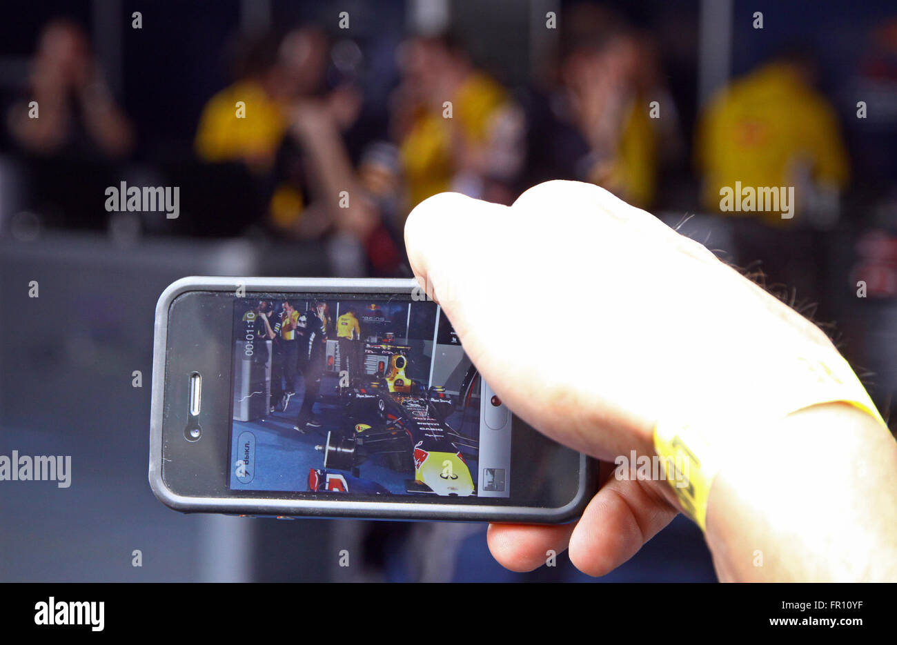 KYIV, UKRAINE - MAY 19, 2012: Visitors take a photos of Red Bull RB7 ...
