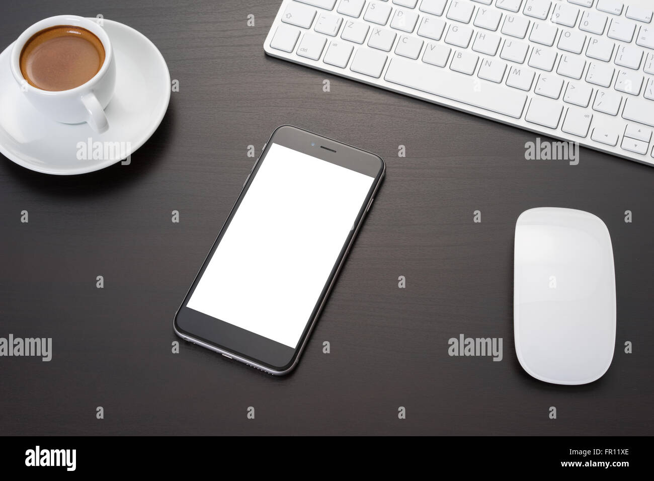 Smartphone and computer keyboard on office table Stock Photo - Alamy