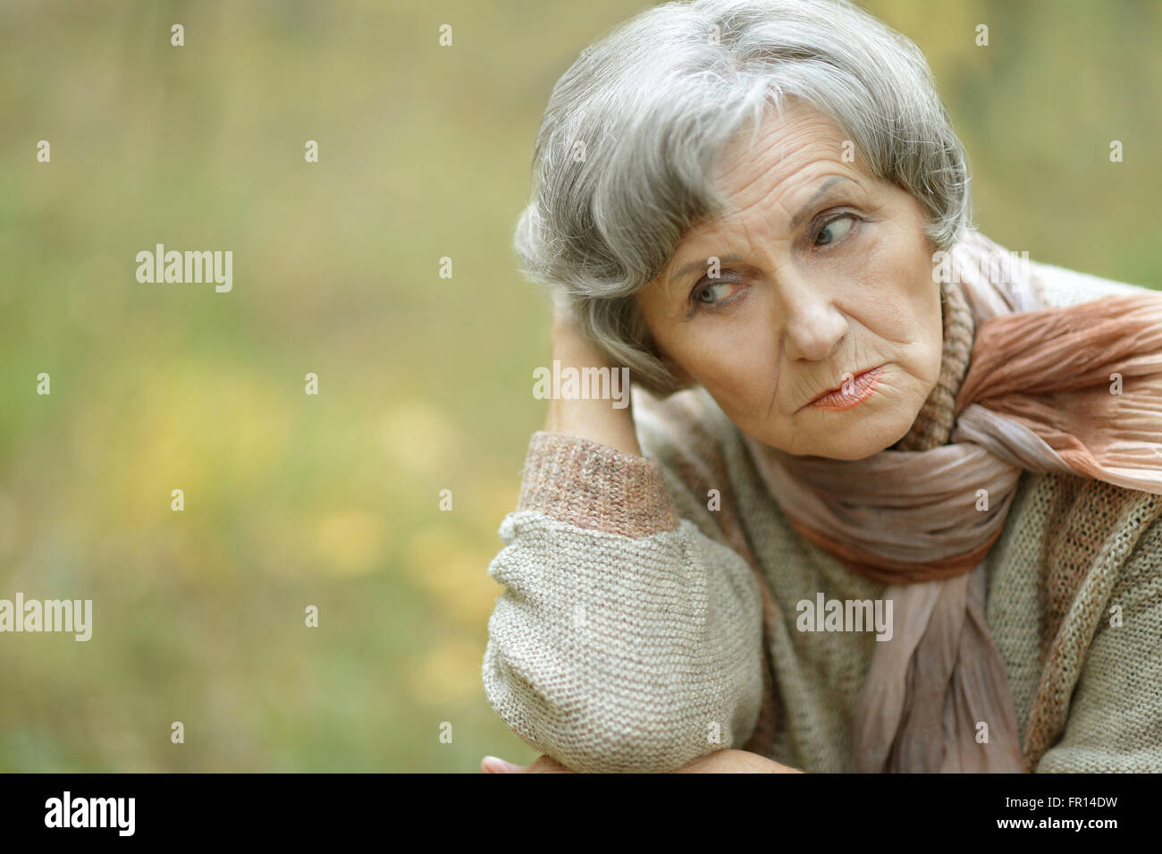 sad old woman Stock Photo - Alamy