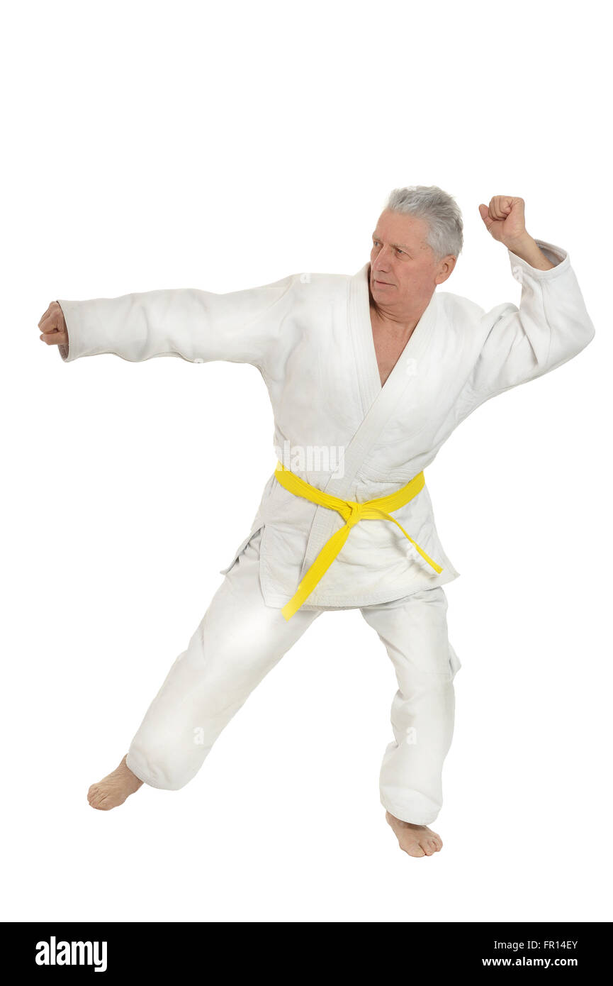 Senior man in karate pose Stock Photo - Alamy