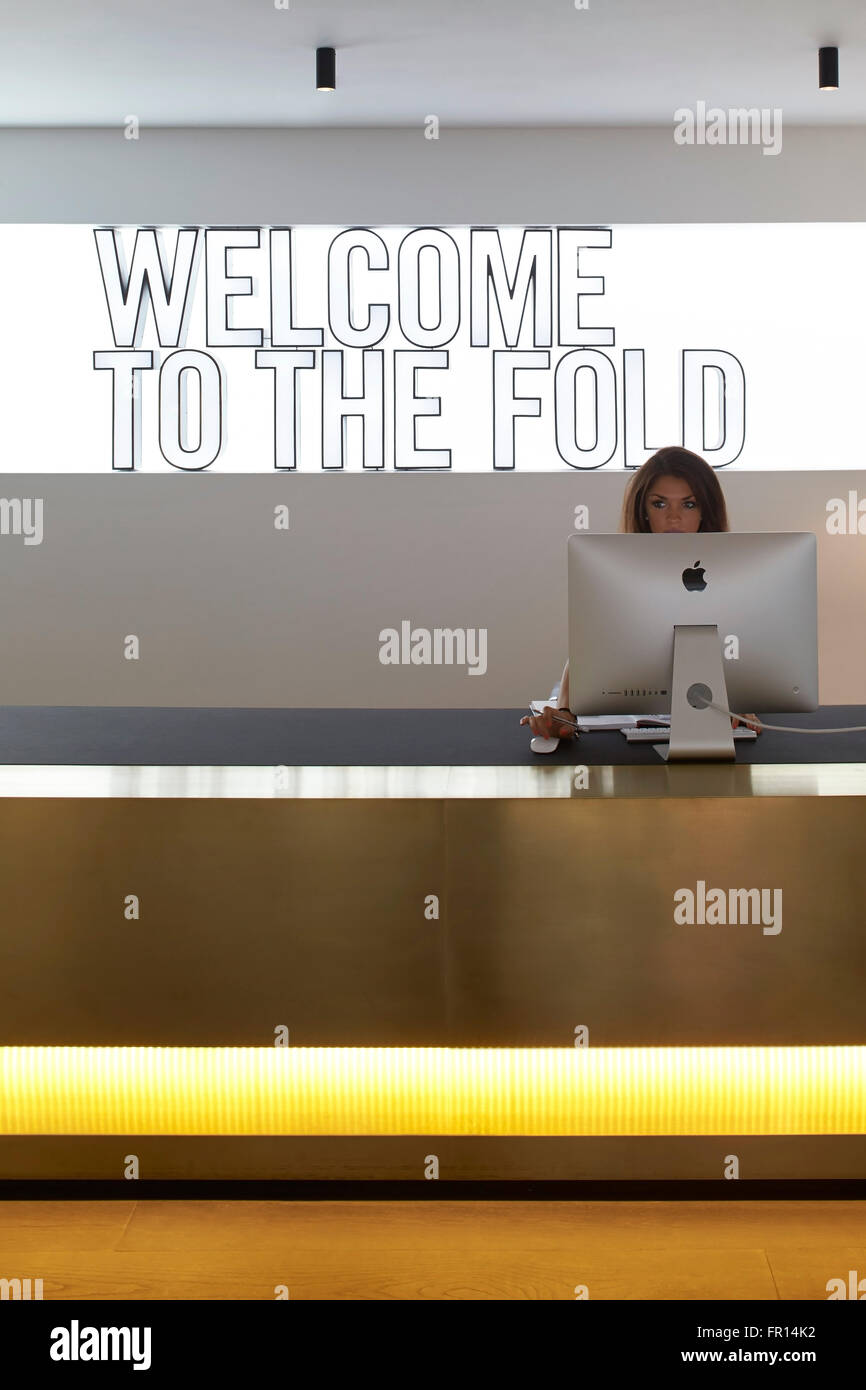 Brushed brass reception desk. Fold 7 Offices, London, United Kingdom ...
