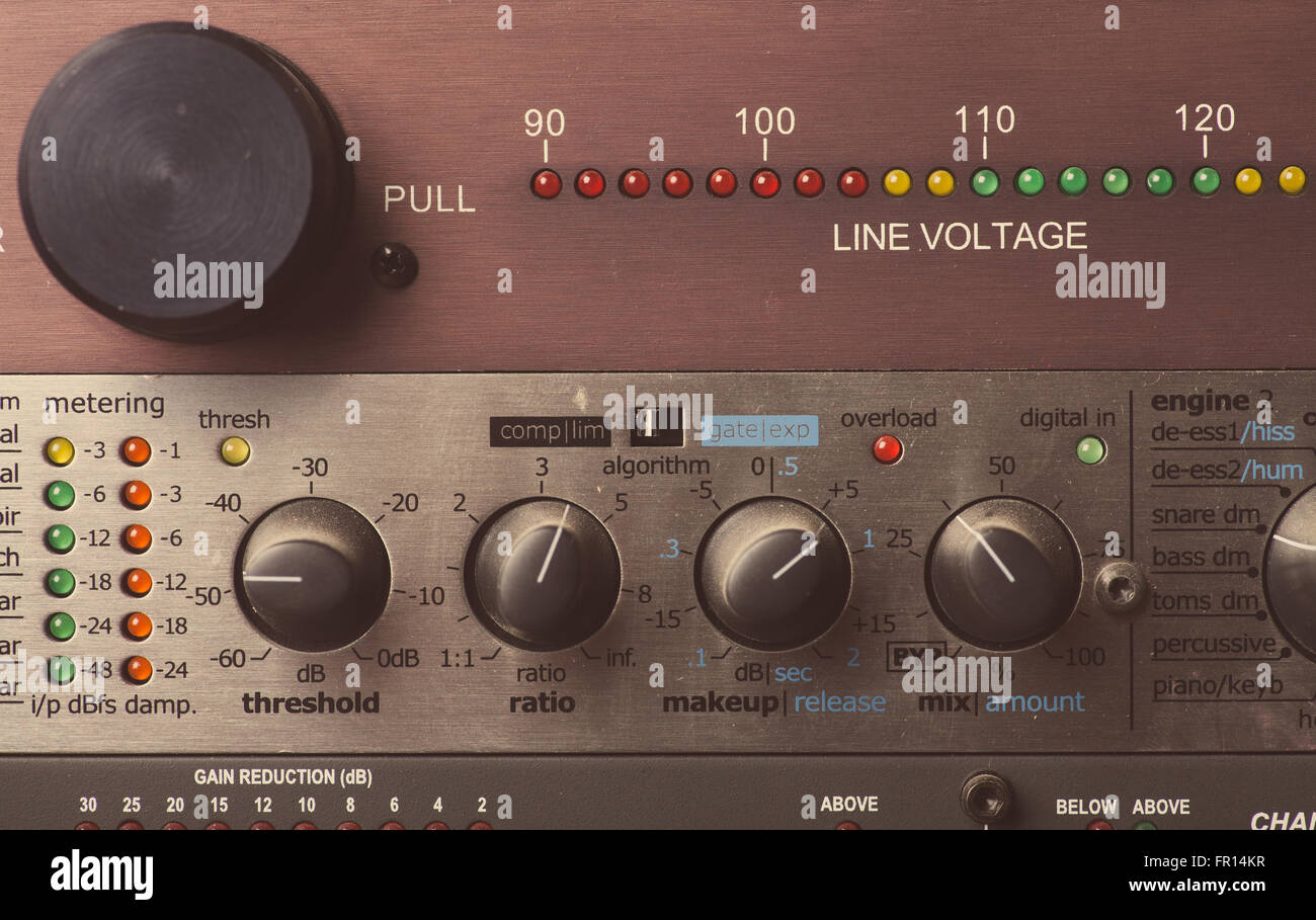 Color image of many buttons on a sound mixer in a recording studio ...