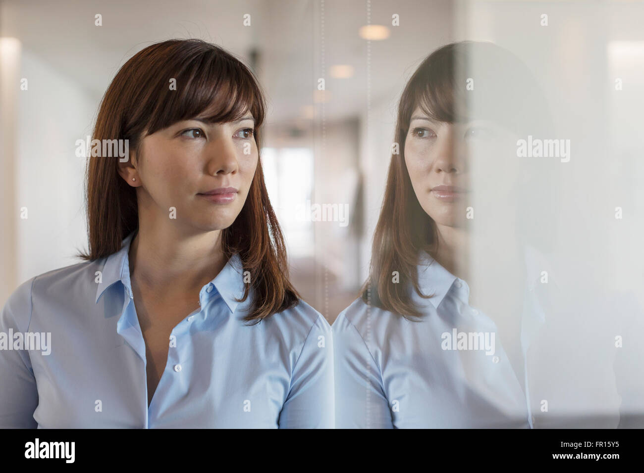 Person looking out of office window hi-res stock photography and images ...