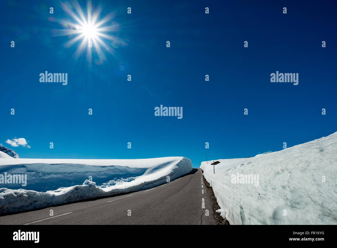 Mountain road in Norway with high snow wall Stock Photo - Alamy