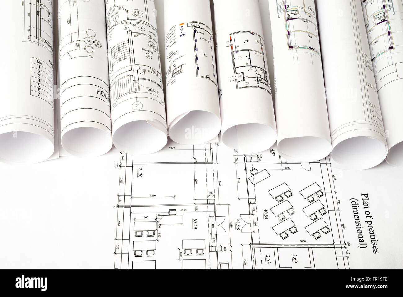 Architecture plan and rolls of blueprints, top view. Building concept ...