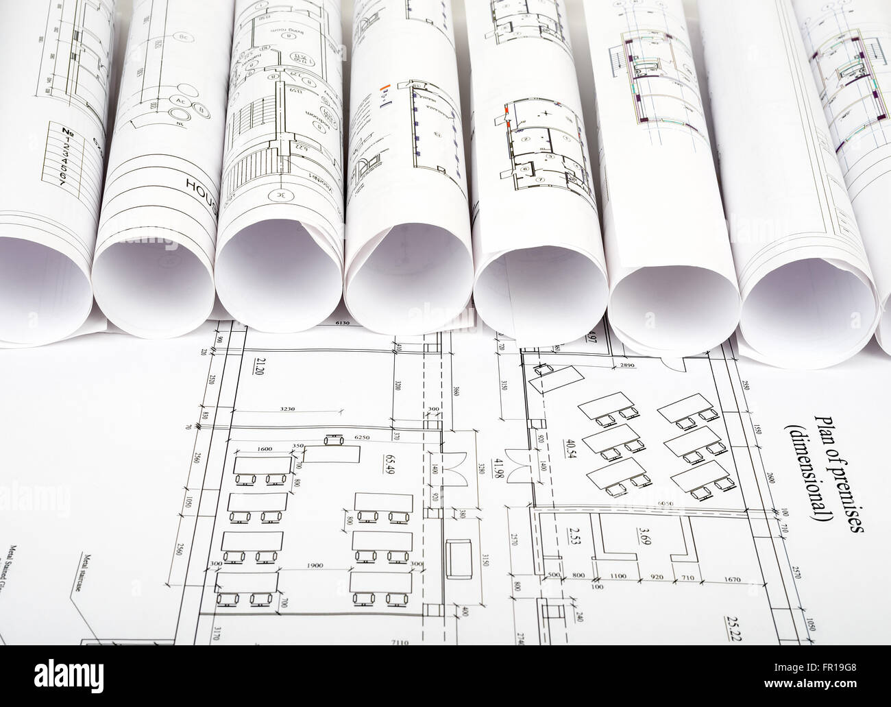 Architecture plan and rolls of blueprints. Building concept Stock Photo ...