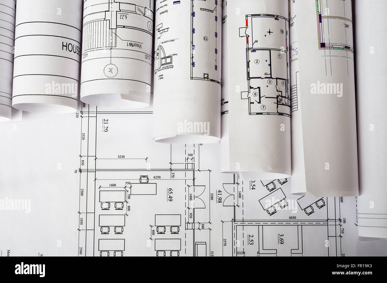 Blueprints and rolls of blueprints, top view. Building concept Stock ...